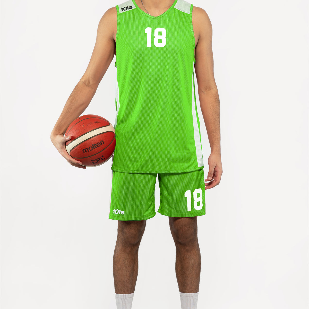 Named double sided basketball apparel – Tūta